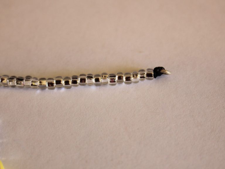How to make a beaded necklace using nylon thread